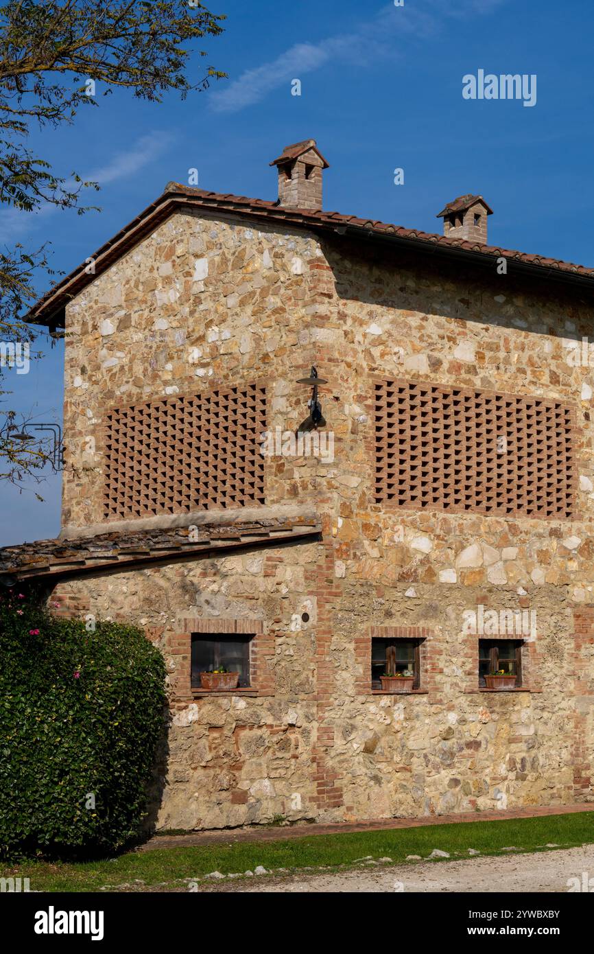 Traditional architecture of a farmhouse on a lavender farm in Sienna ...