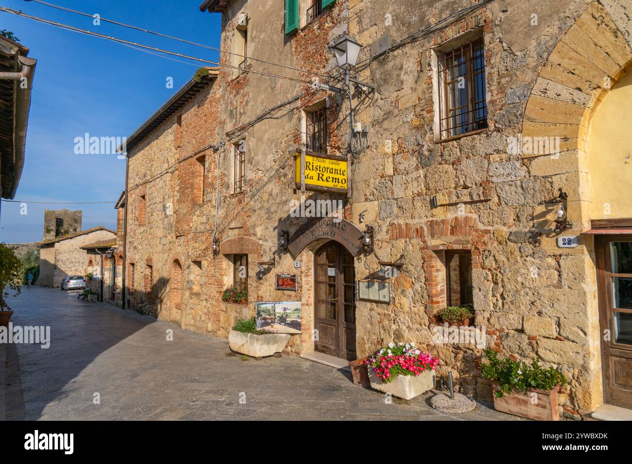 A restaurant on the Piazza Roma in the medieval walled town of ...