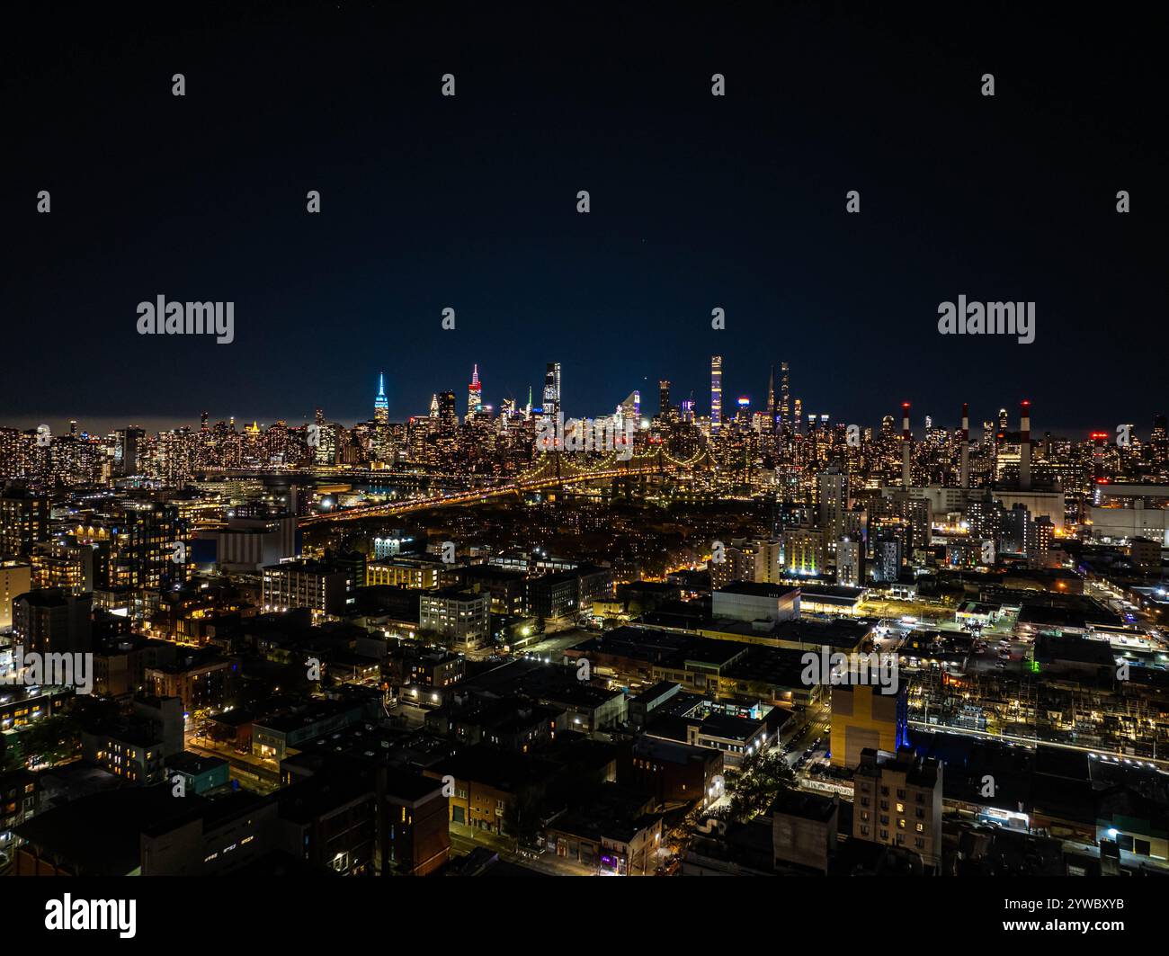 Aerial view of Queens district, with East River, Queensboro Bridge, and ...