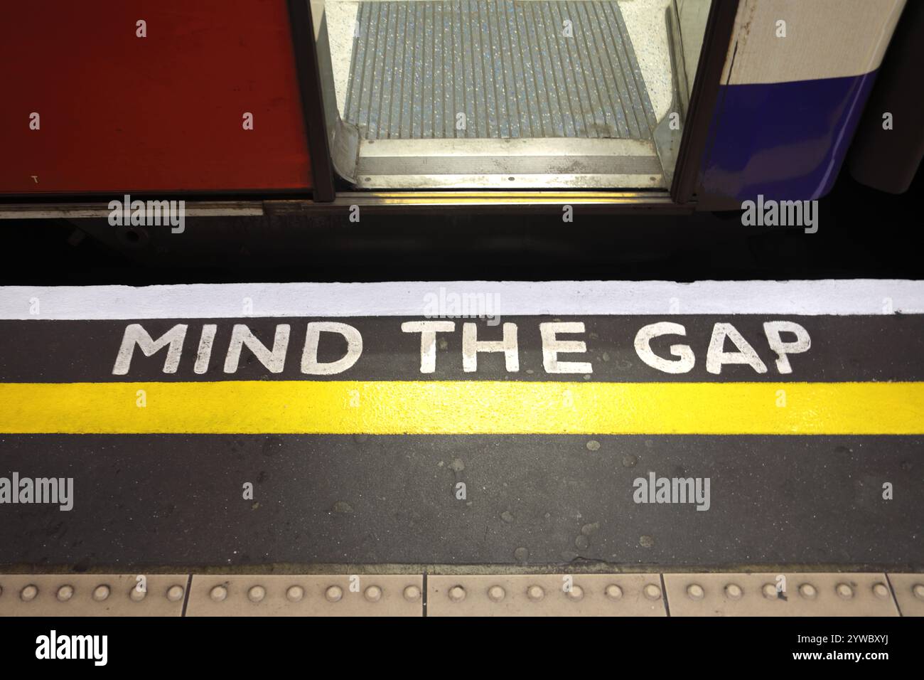 Mind the Gap warning sign Stock Photo - Alamy