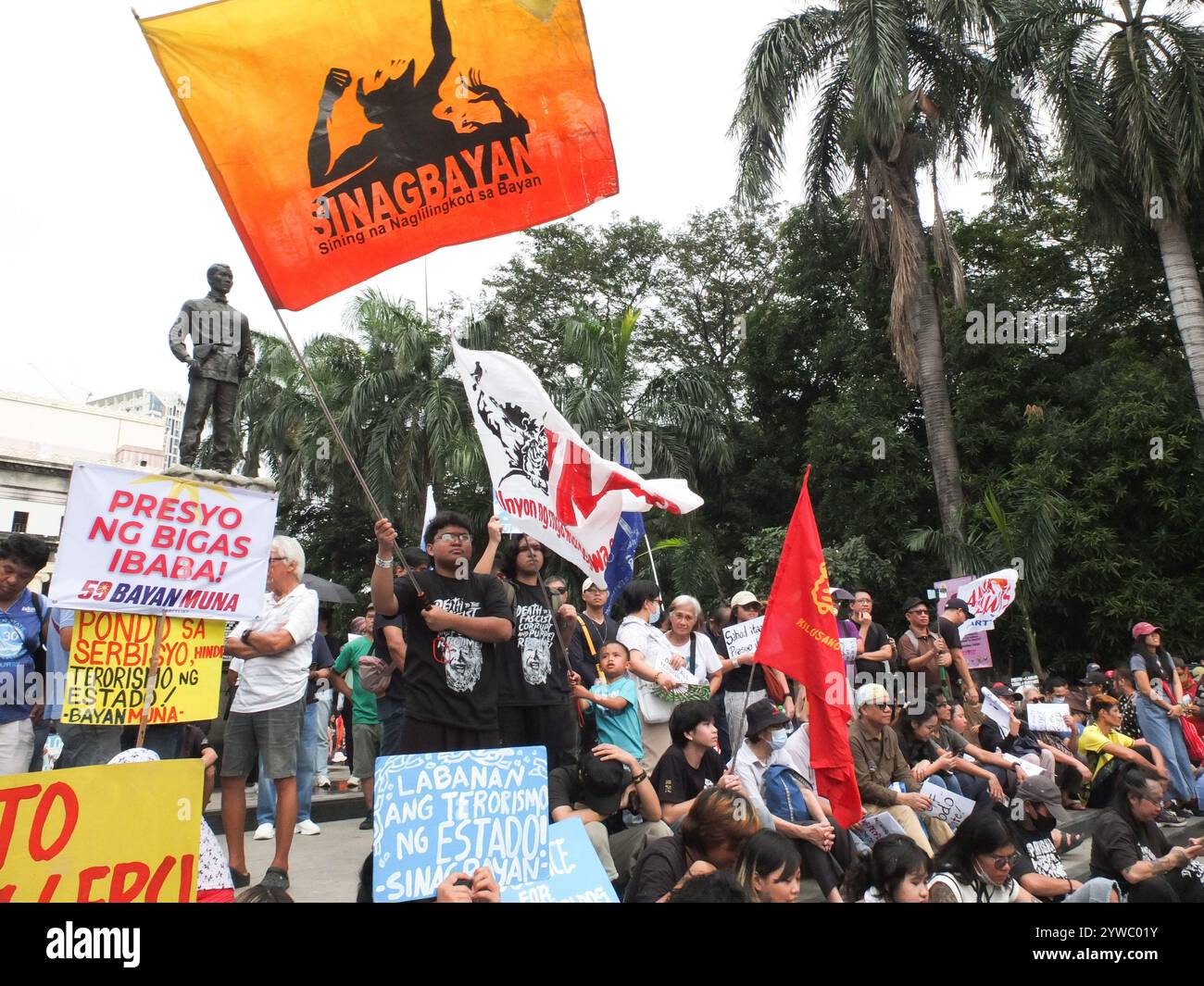 Protesters wave their flags and streamers at Liwasang Bonifacio during ...