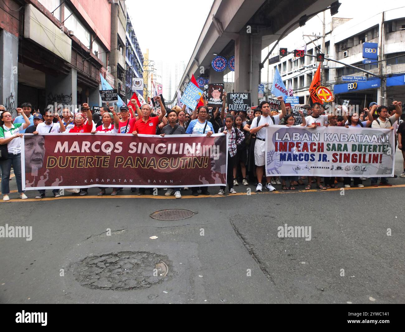 Protesters holding their streamers were stopped at Claro M. Recto ...