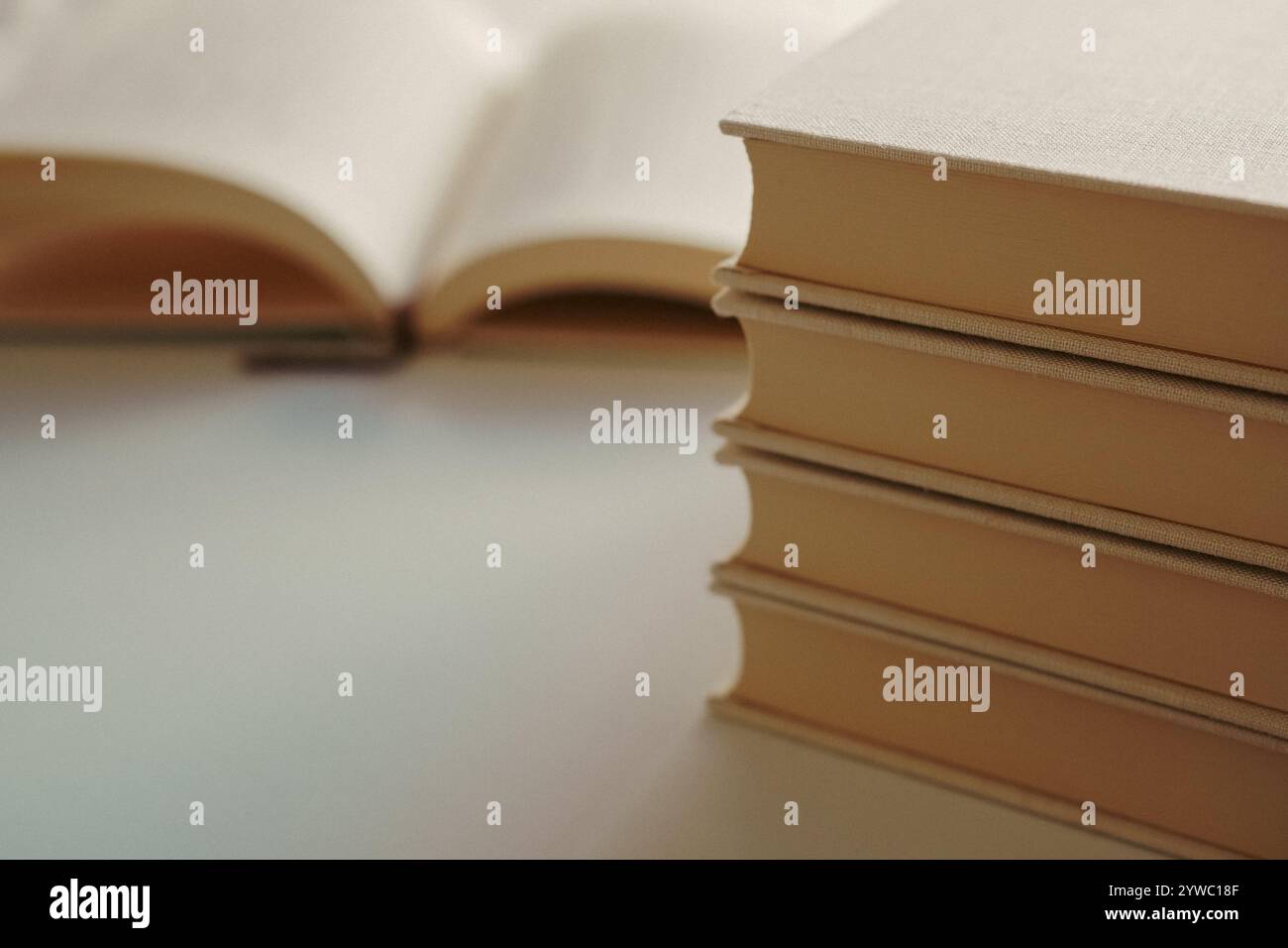 Open blank book on top of stacks of books, Mock up Stock Photo - Alamy