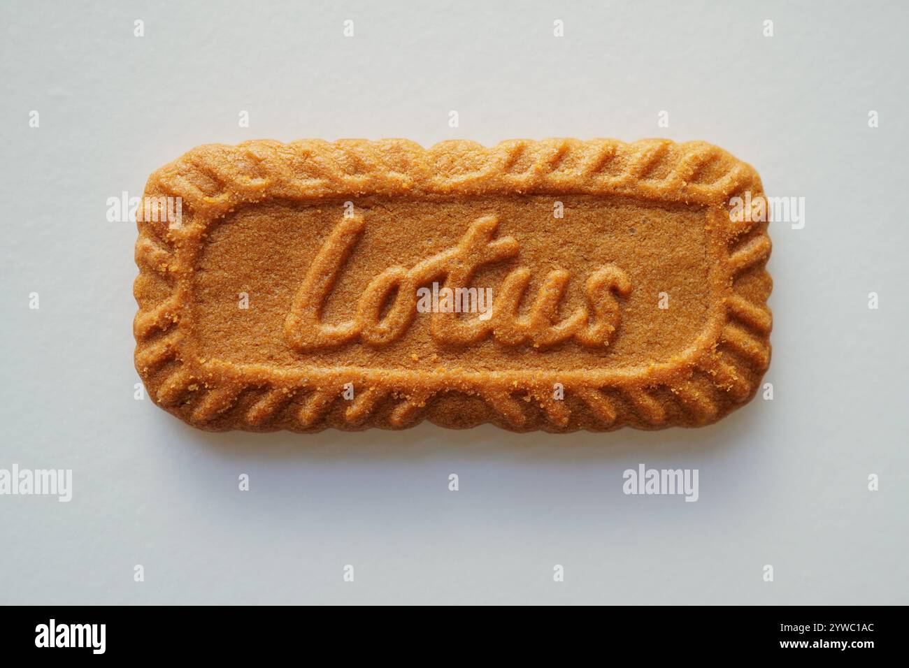 Closeup of White table filled with Lotus Biscoff , Belgium biscuit with ...