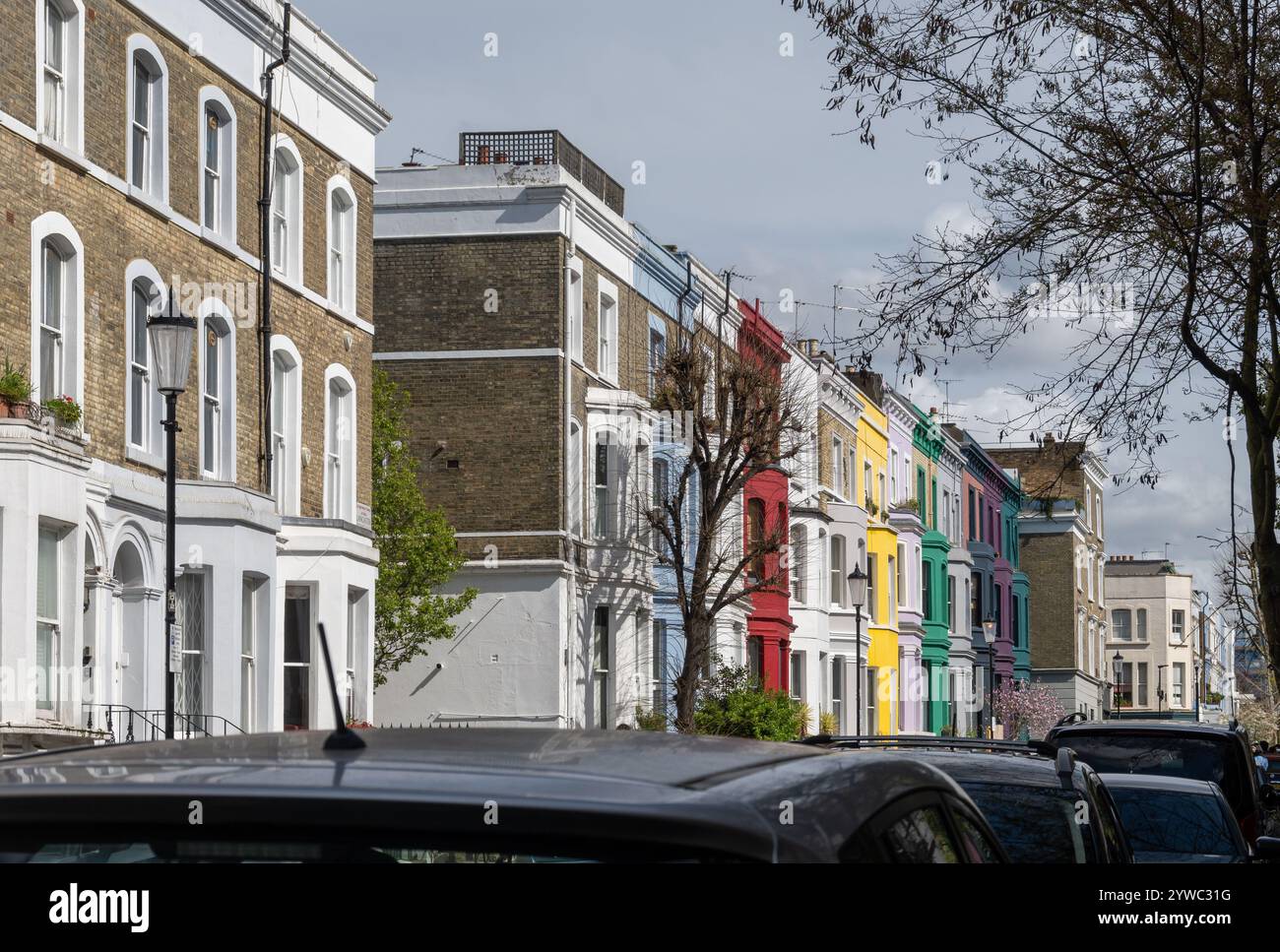 Touristic route on Notting Hill, walking on streets with colourful ...