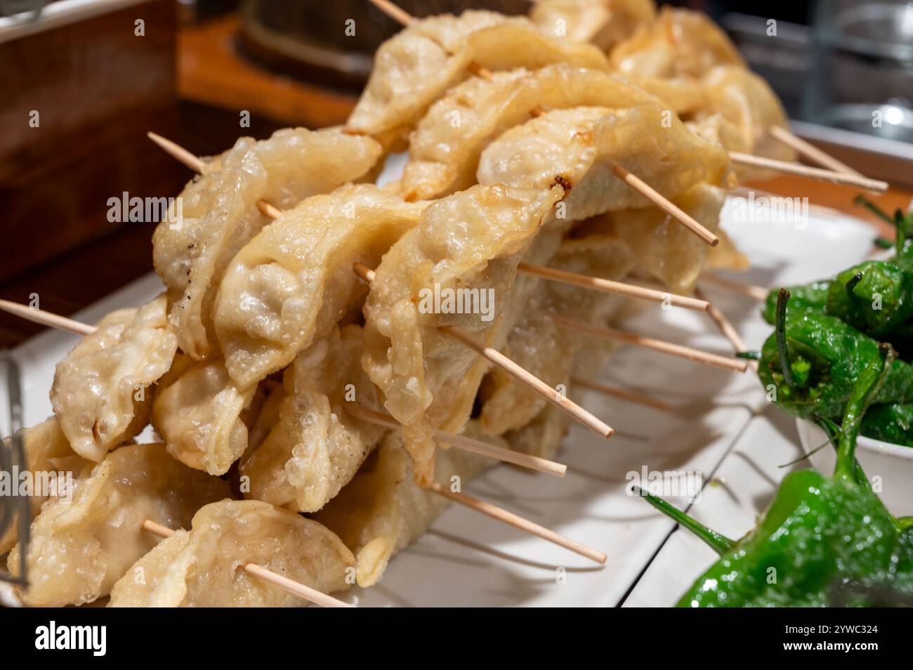 Typical snacks of Basque Country, pinchos or pinxtos skewers with small ...
