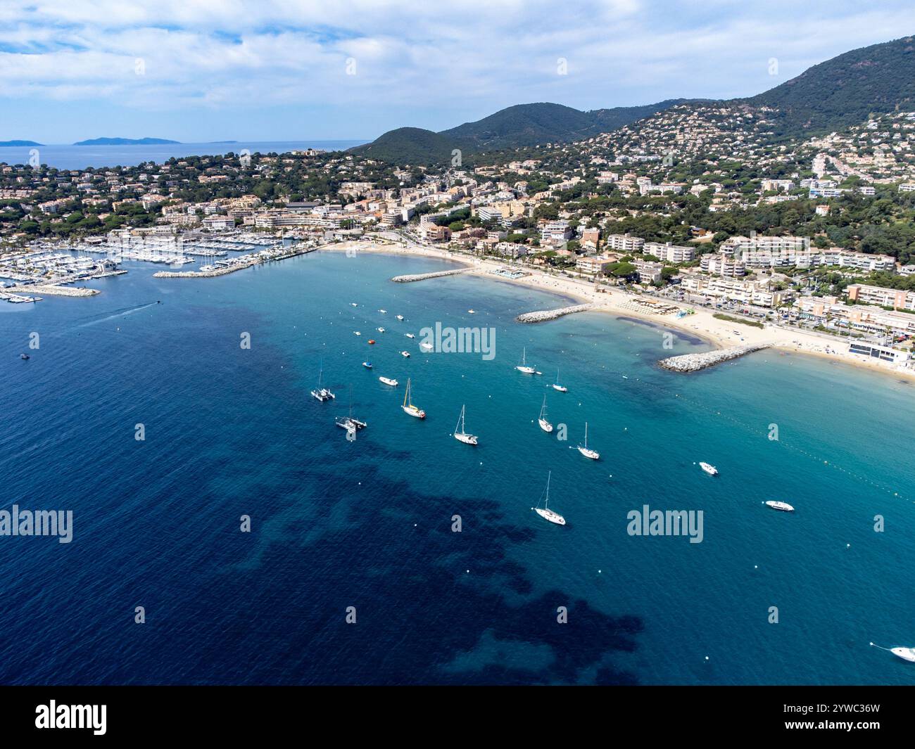 Aerial view on boats, crystal clear blue water of Plage du Debarquement ...