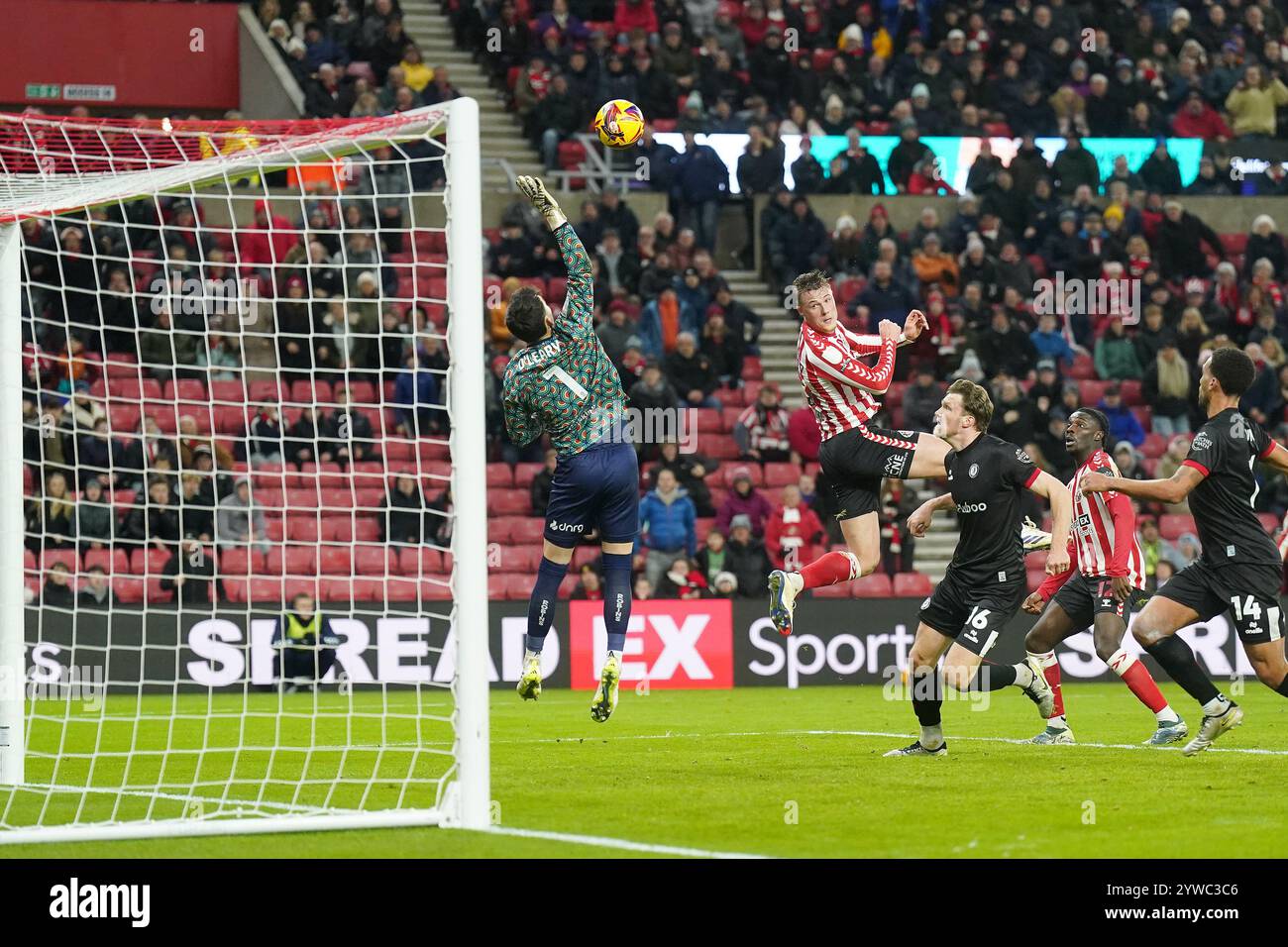 Sunderland's Daniel Ballard attempts a header on goal during the Sky ...