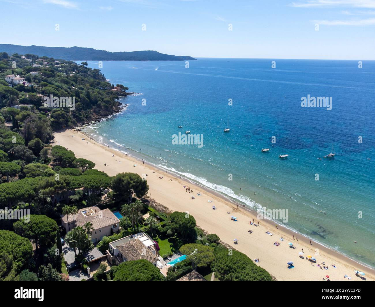 Aerial view on boats, crystal clear blue water of Plage du Debarquement ...