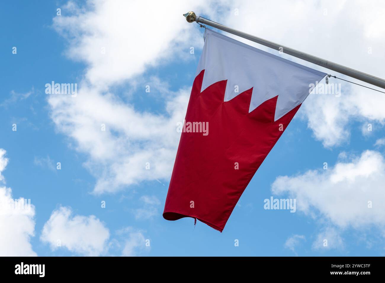 Red white National flag of Bahrain, Kingdom of Bahrain, island country ...
