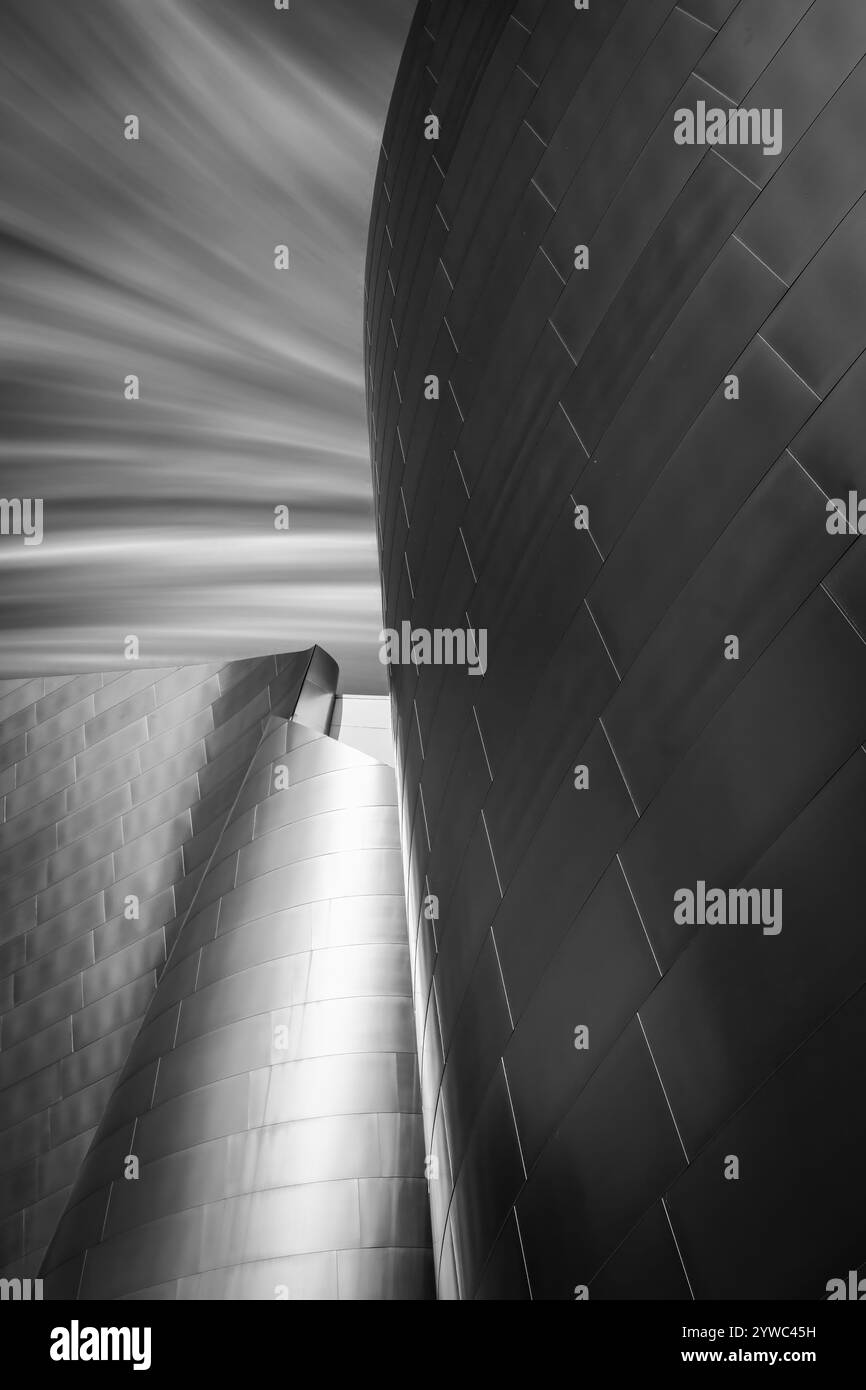 Curved steel architecture merges with dynamic cloud formations in this ...