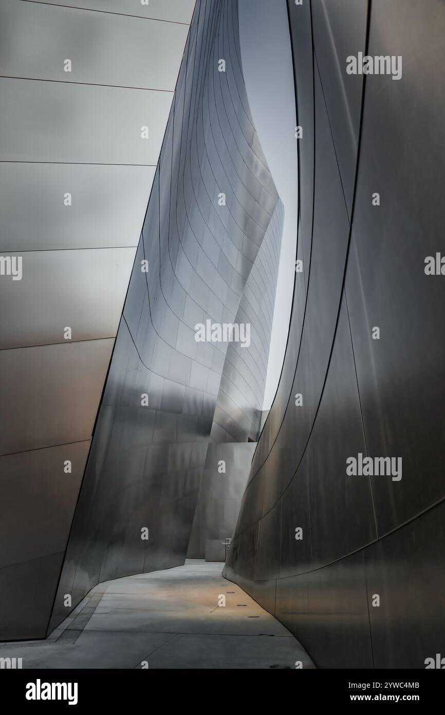 Contemporary architecture showcasing a pathway between sleek, curved ...