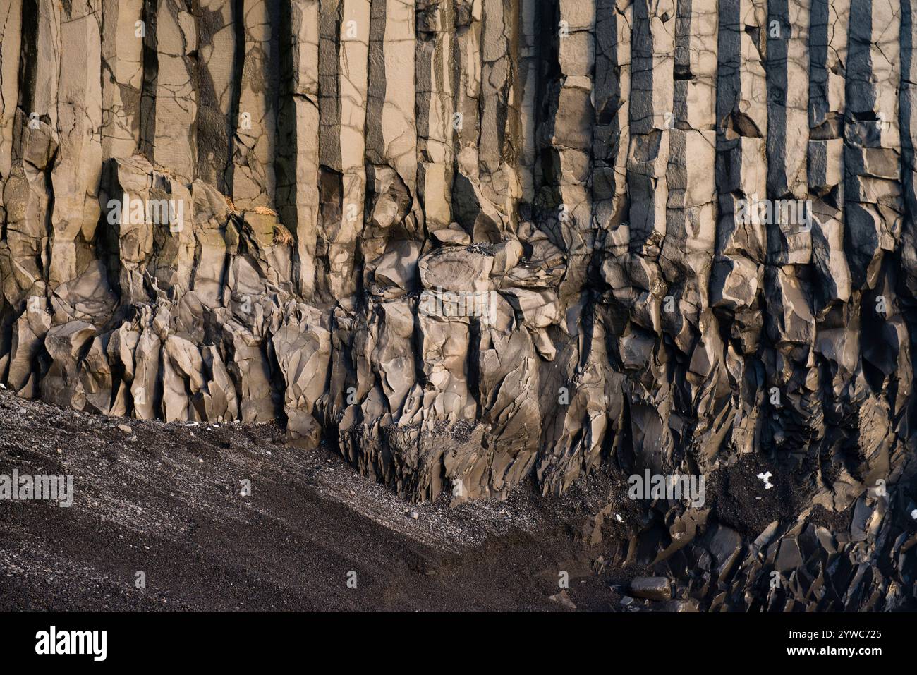 Basaltic lava flow solidified forming columns in the beaches of Vik ...