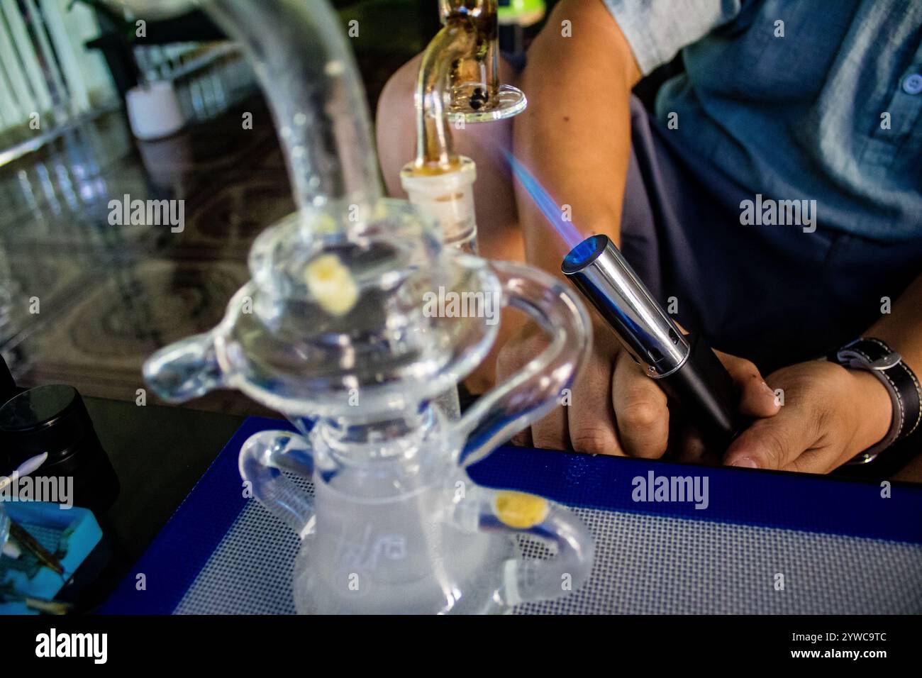 Hua Hin, Thailand, December 06, 2024 Consumption of cannabis resin ...