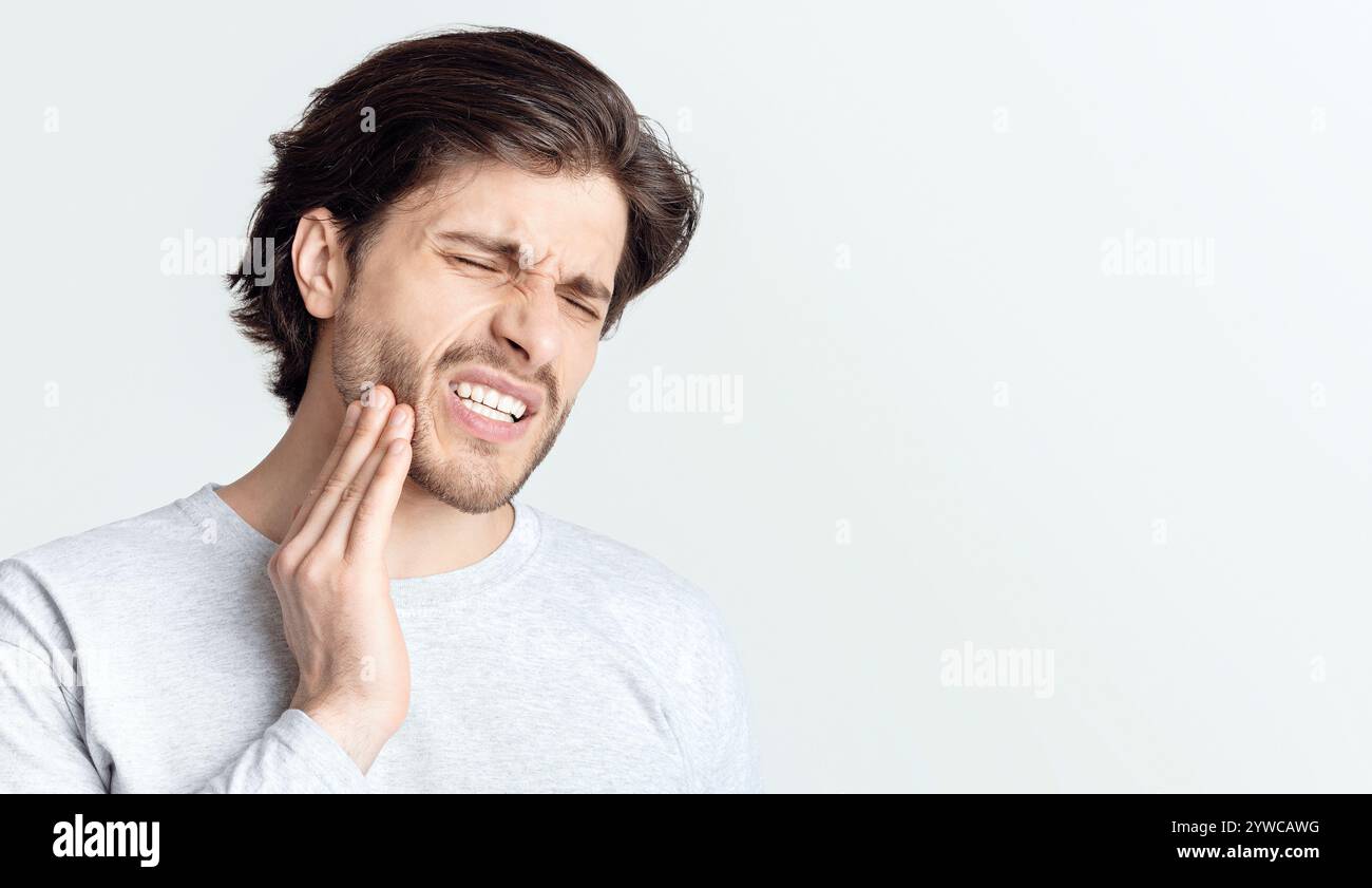 Dental problems concept. Man suffering from toothache Stock Photo - Alamy