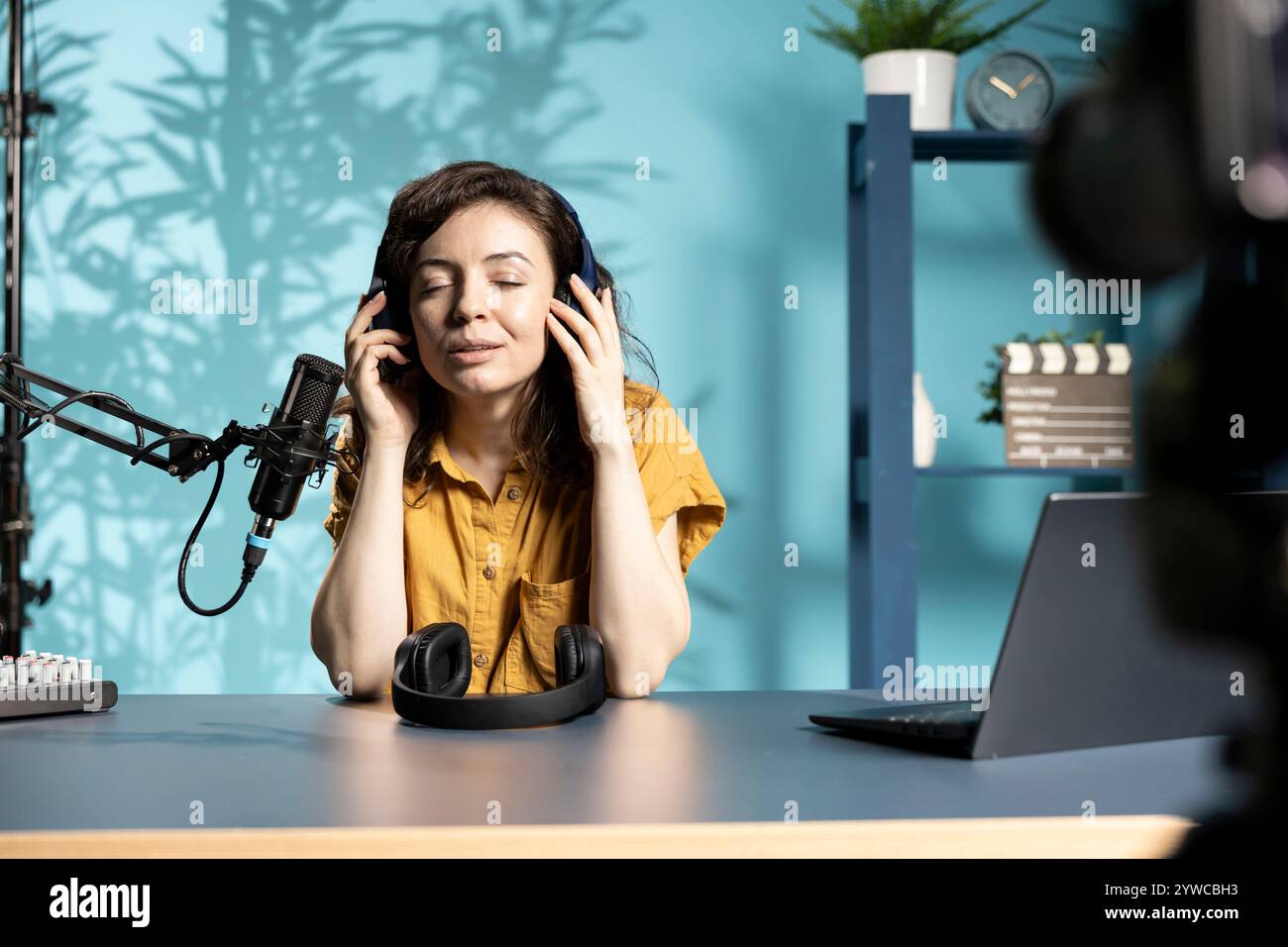 Audiophile listens to albums from favorite artist, enjoying music in ...