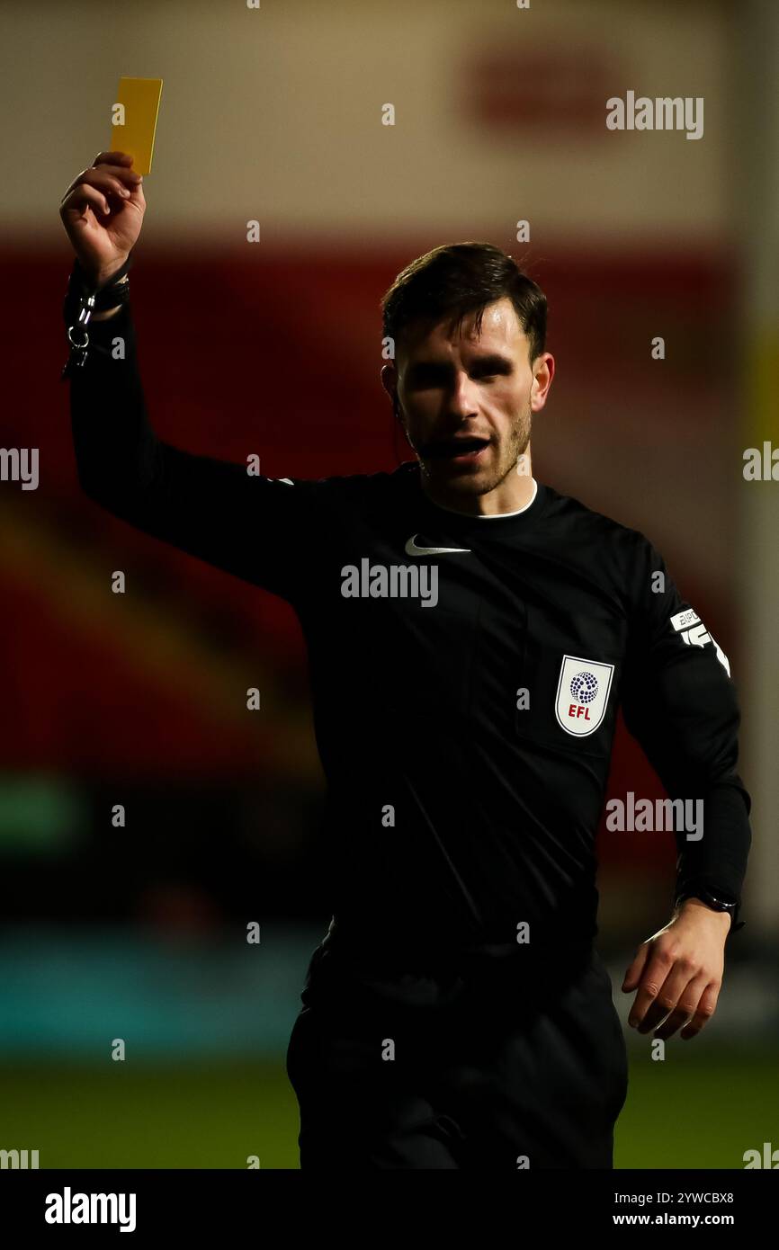 Ashqar Ahmed of Reading is given a Yellow Card by Referee Elliot Bell ...