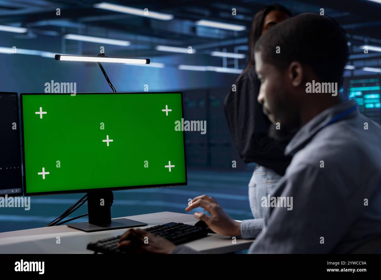 Admin In Data Center Running System Diagnostic Tests Using Green Screen Computer Display Worker