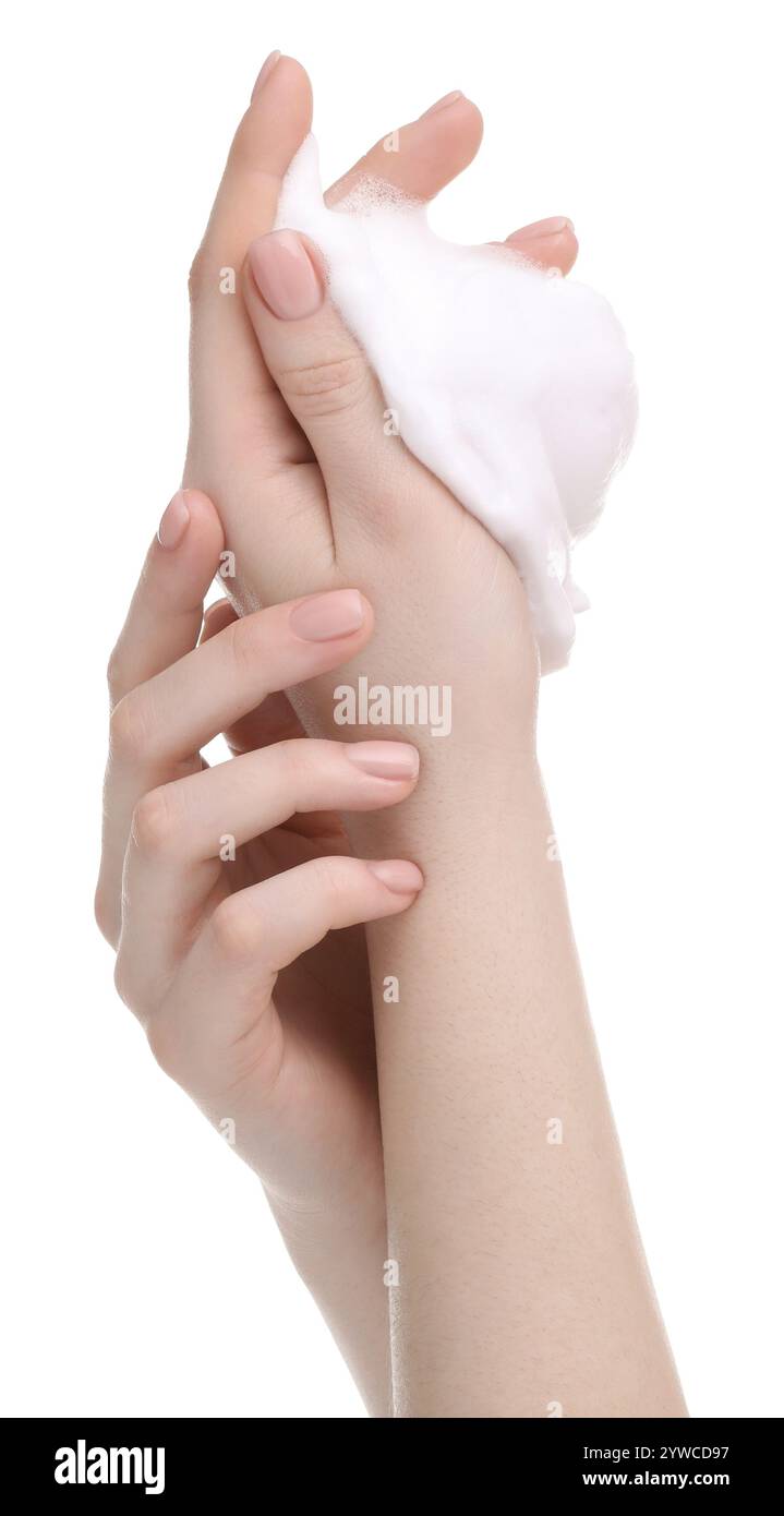 Woman with cleansing foam on hands against white background, closeup ...