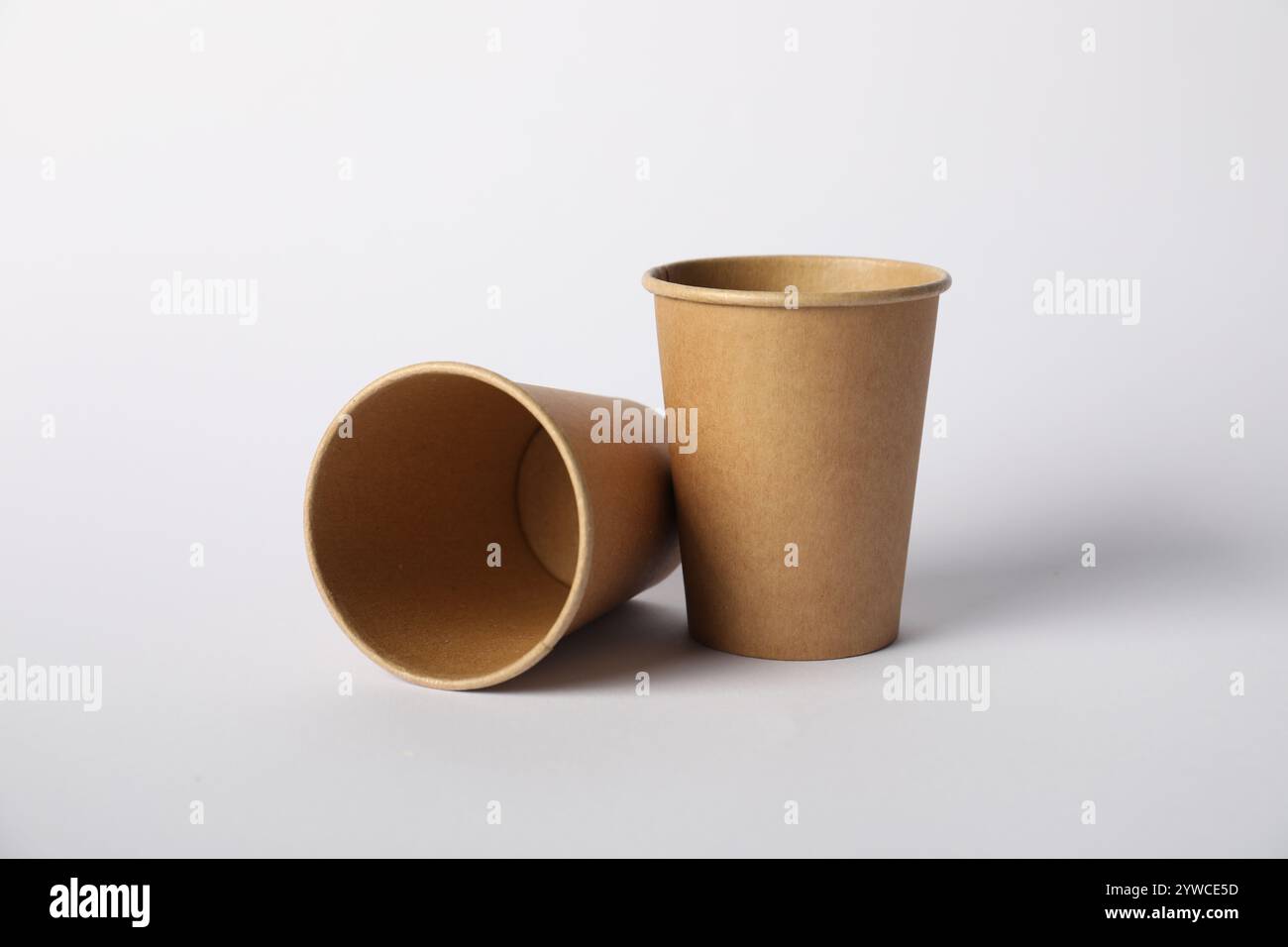 Paper cups on white background. Mockup for design Stock Photo - Alamy