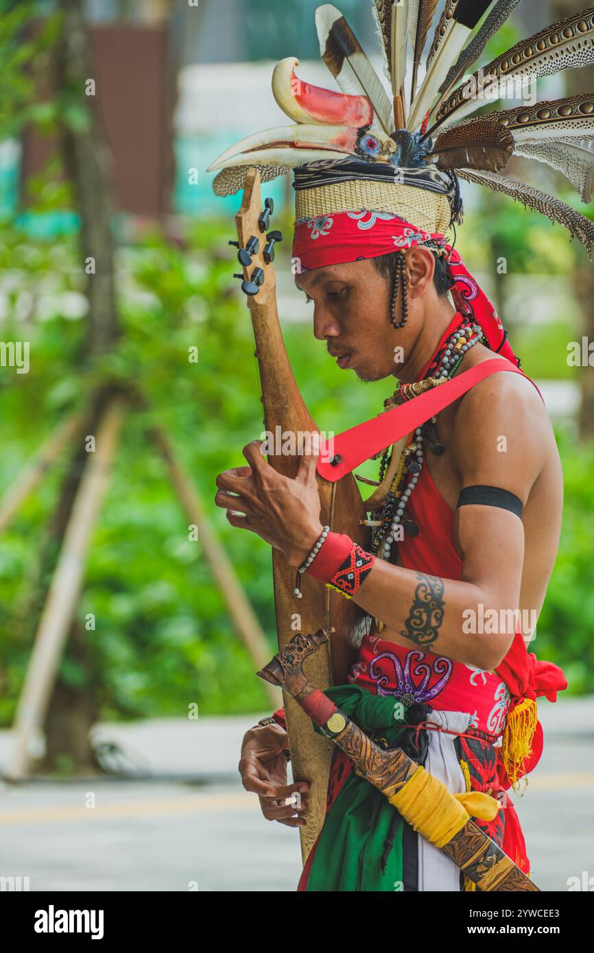 IKN, Indonesia - November 24th, 2024. He wears the traditional dayak ...