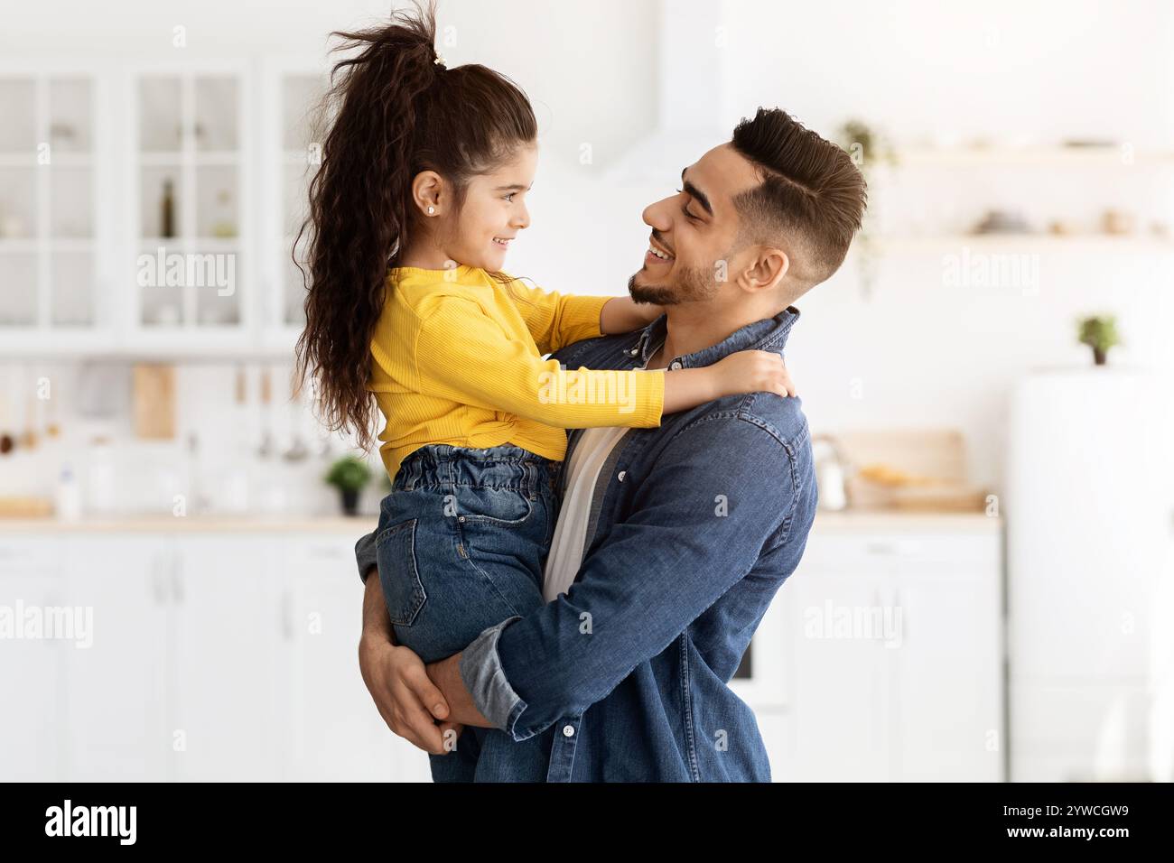 Father's Love. Portrait Of Loving Arab Dad Holding His Cute Little Daughter Stock Photo - Alamy