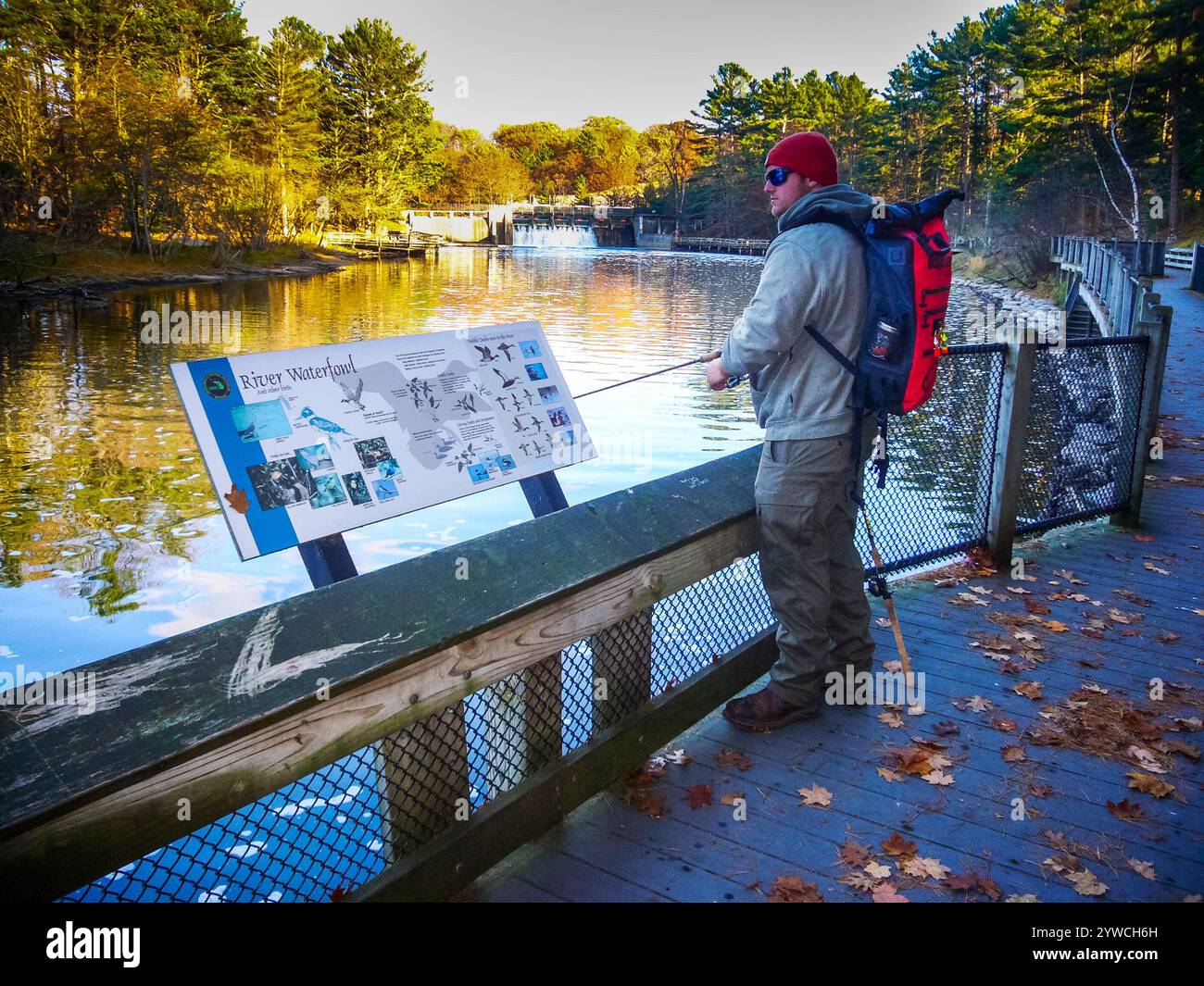 Fisherman enjoy an autumn day along the Big Sable River in Ludington ...