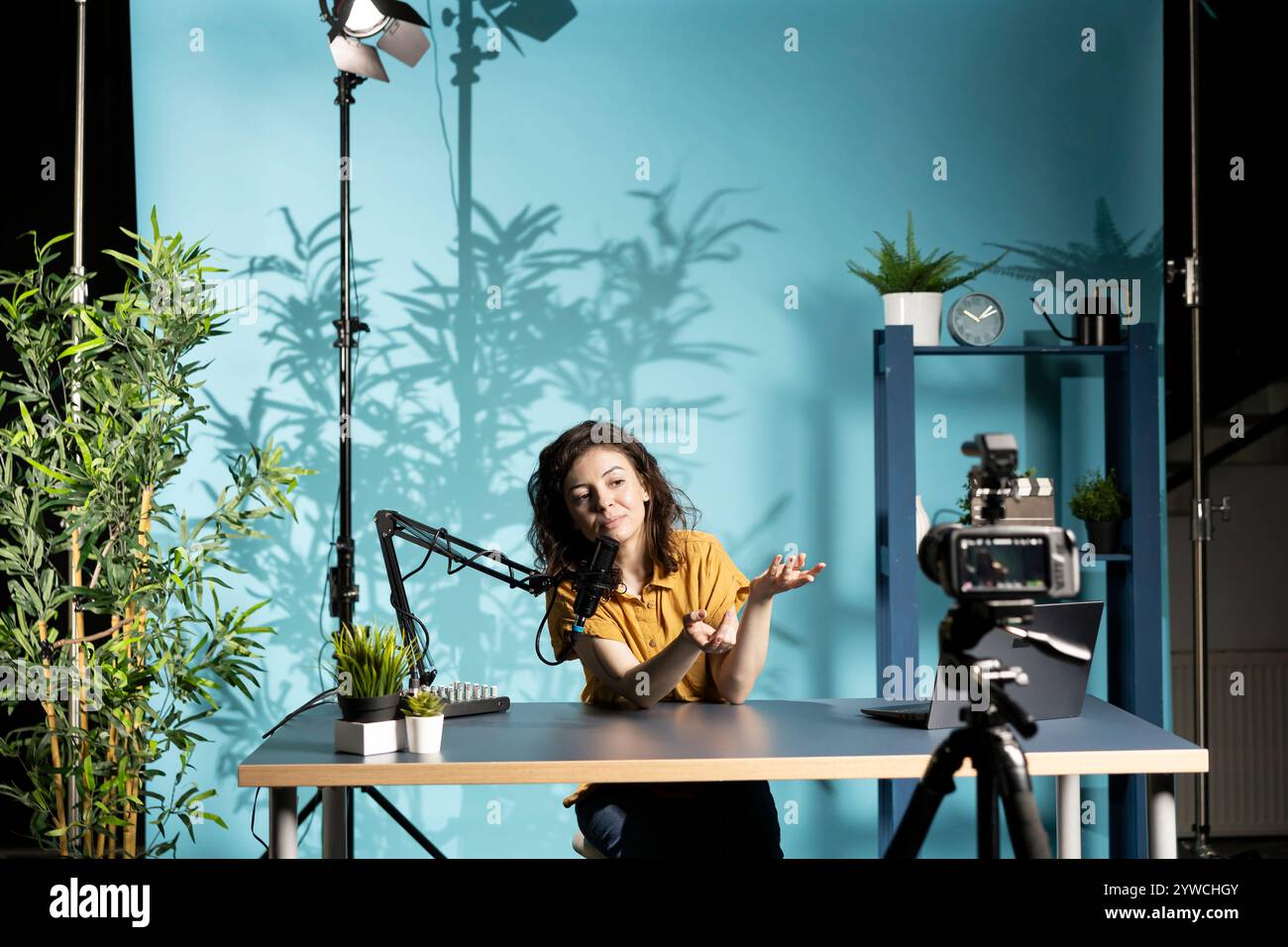 Influencer hosting internet show, speaking into professional mic ...