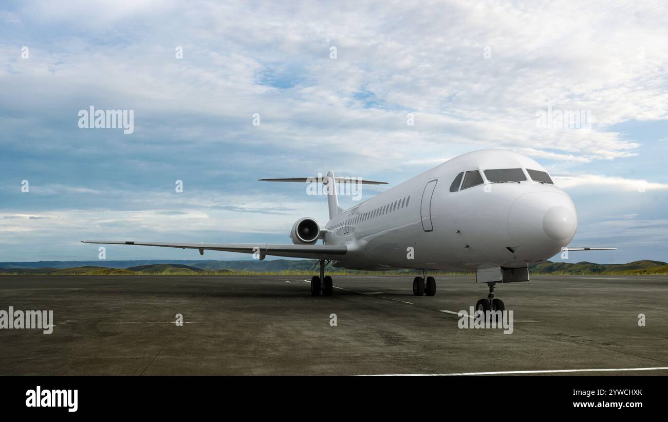 Commercial airplane on the runway with a blue sky background. Travel by ...