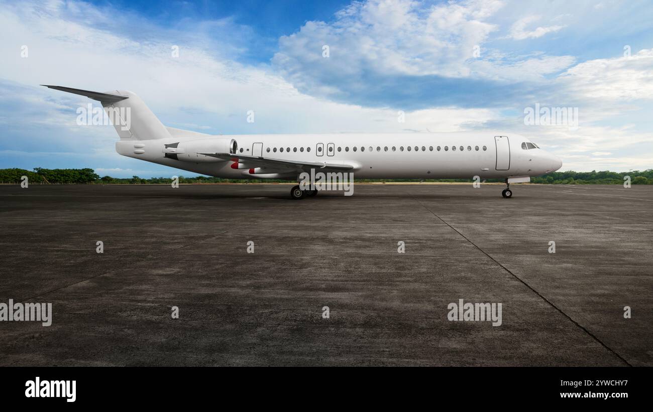 Commercial airplane on the runway with a blue sky background. Travel by ...