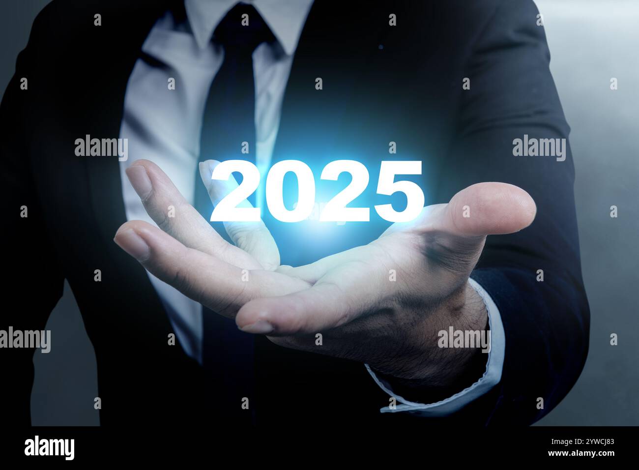 Business hand showing of 2025 number on his palm. Happy New Year ...