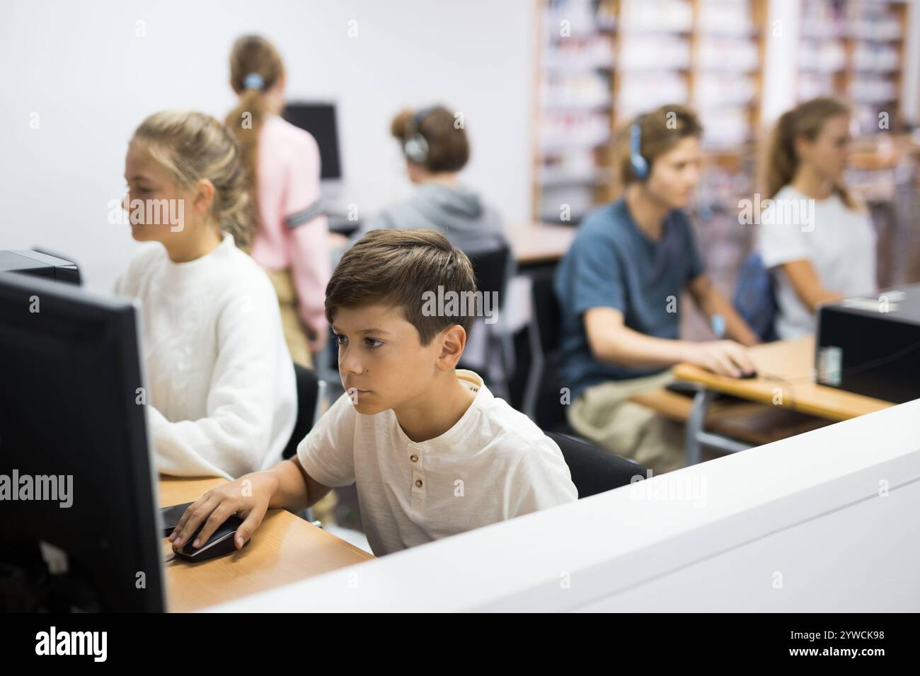Portrait of a ten-year-old schoolboy at a computer Stock Photo - Alamy