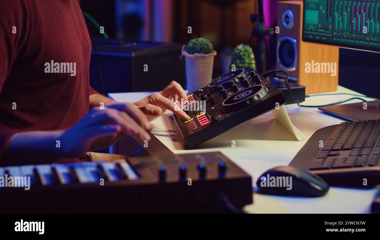 Audio engineer working with soundboard to create the perfect sounds for ...