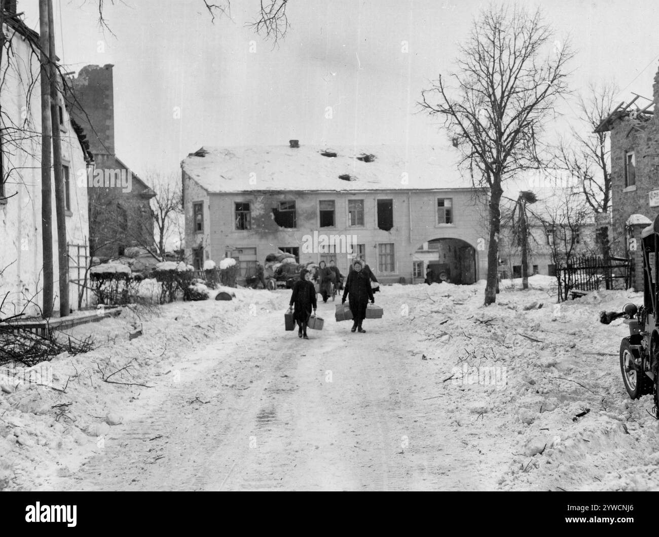 Belgian civilians evacuate the town of Amel during the Battle of the ...