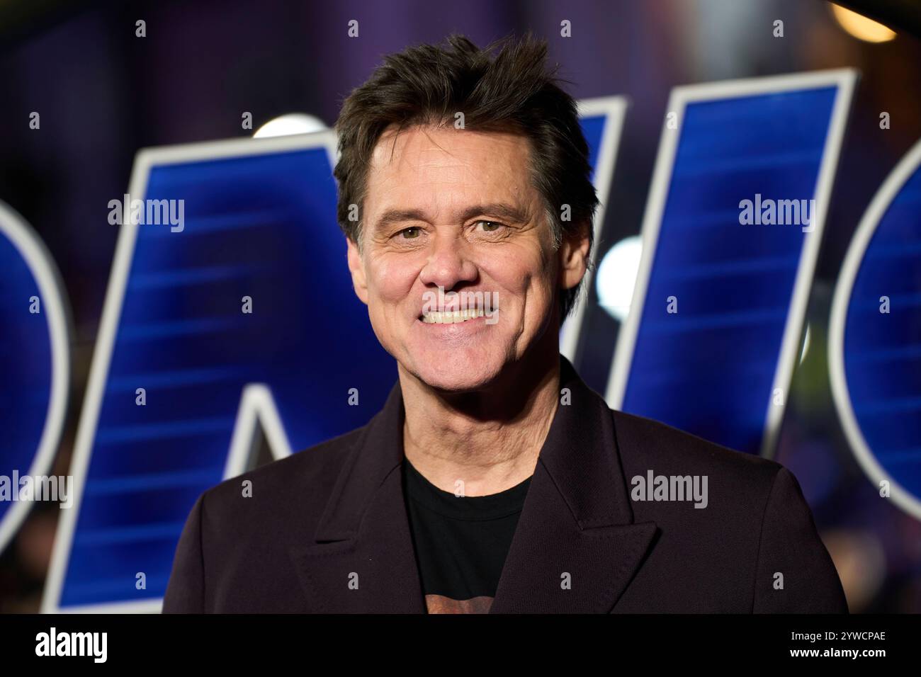 Jim Carrey poses for photographers upon arrival at the premiere of the ...