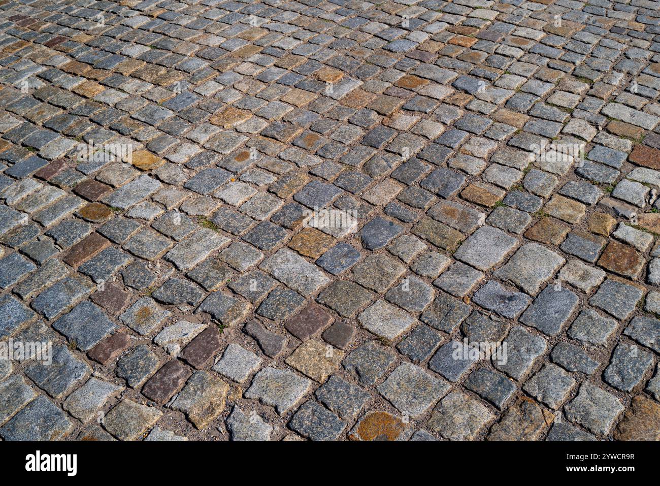 Background of bricks road. Background with bricks road. Stone cladding ...