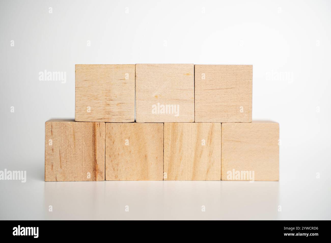 Wooden toys isolated on white background, cubes. Stack of seven wooden ...