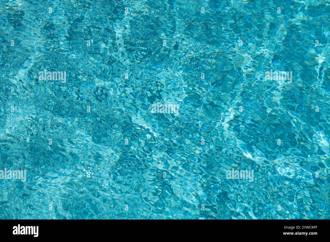 Background of pool water surface. Abstract blue water. Background texture. Water in swimming ...