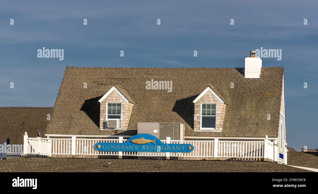 sign for gosman's restaurant on the second floor of a building in ...