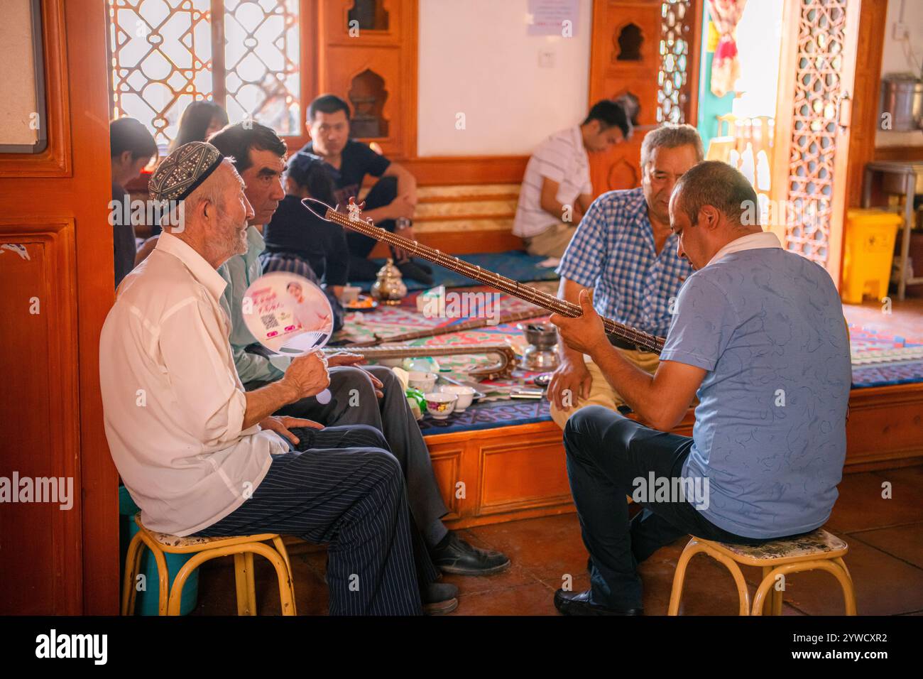 Uyghur people and instruments hi-res stock photography and images - Alamy