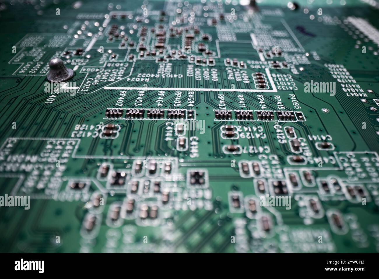 Motherboard with electrons. Circuit board with electrons. Electronic circuit board close up ...