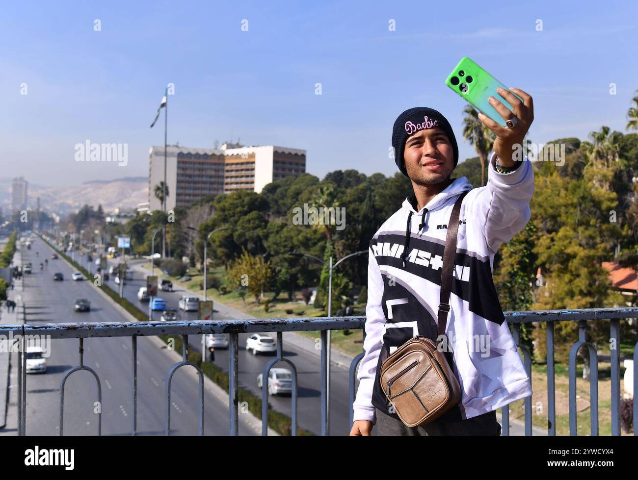 Damascus, Syria. 10th Dec, 2024. A man takes selfies in Damascus, Syria ...