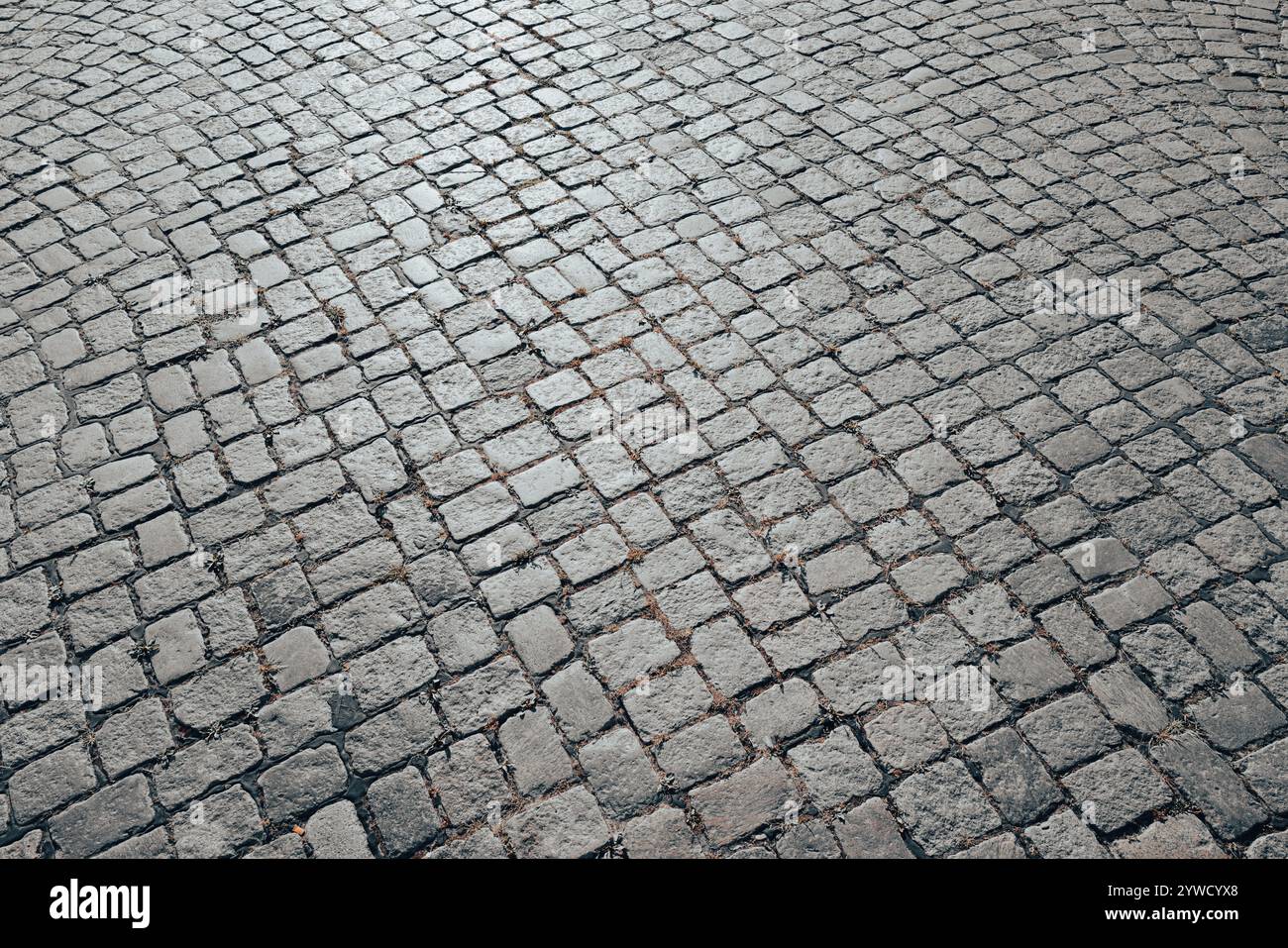 Pavement road. Background of bricks road. Stone cladding pavement ...