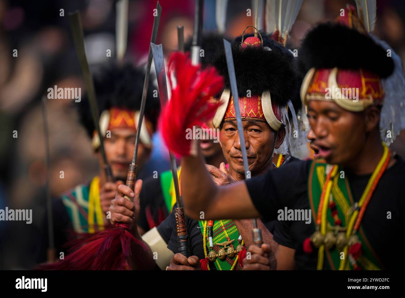 Indigenous Naga tribals dance during the Hornbill Festival in Kisama ...