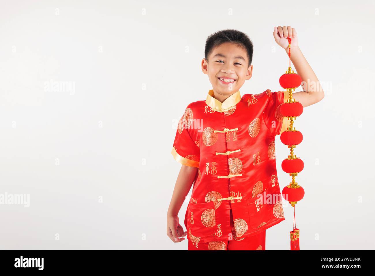 Chinese New Year. Happy Asian Chinese little kid boy smile wearing red ...
