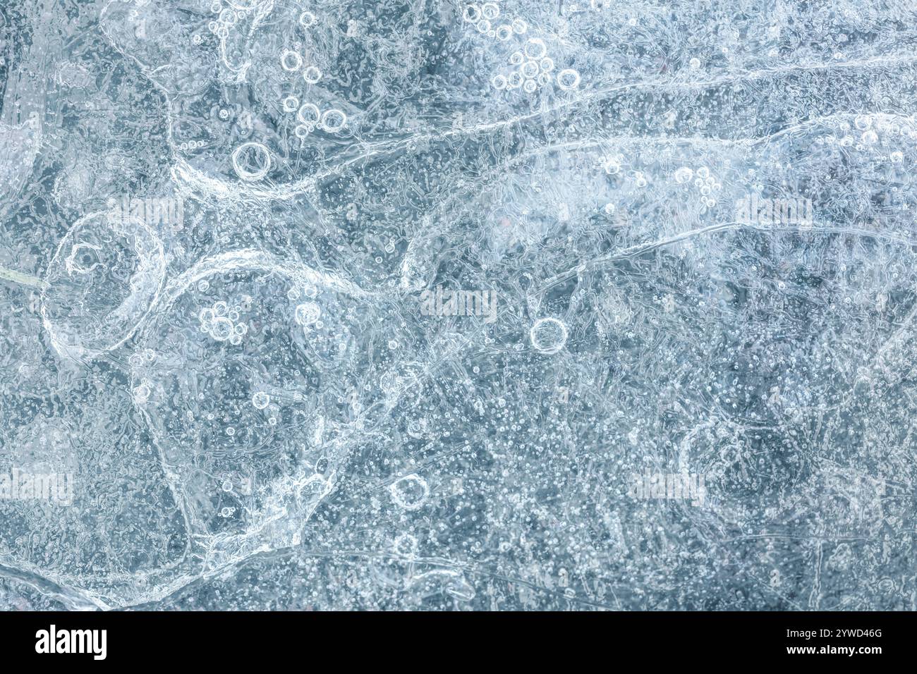frozen river water with air bubbles. frosty ice structure. macro view ...