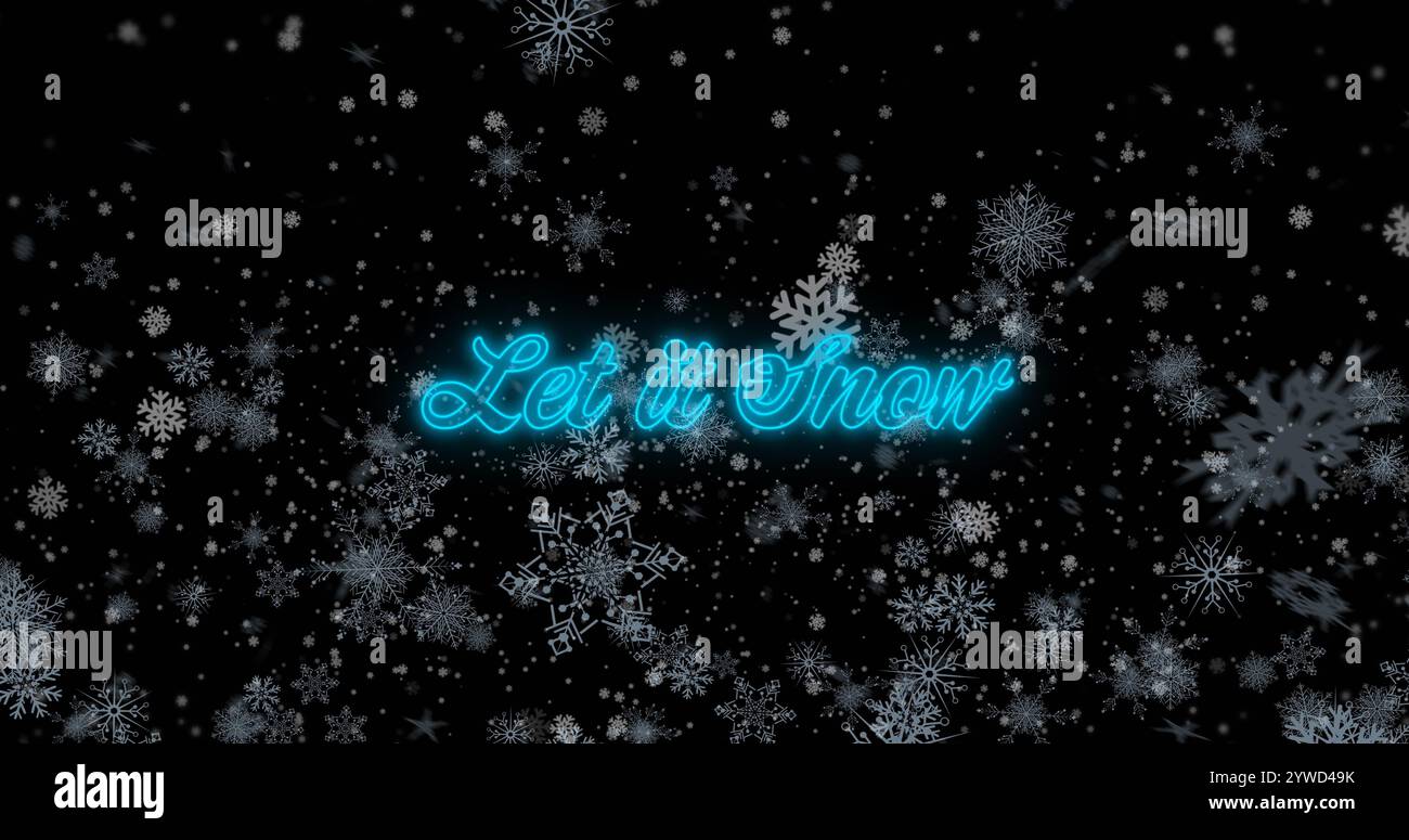 Image of snow falling over let it snow text Stock Photo - Alamy
