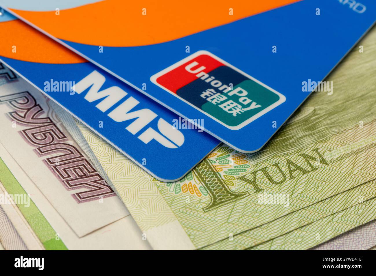 Close-up of Union Pay Logo on credit card and Chinese yuan cash. The ...