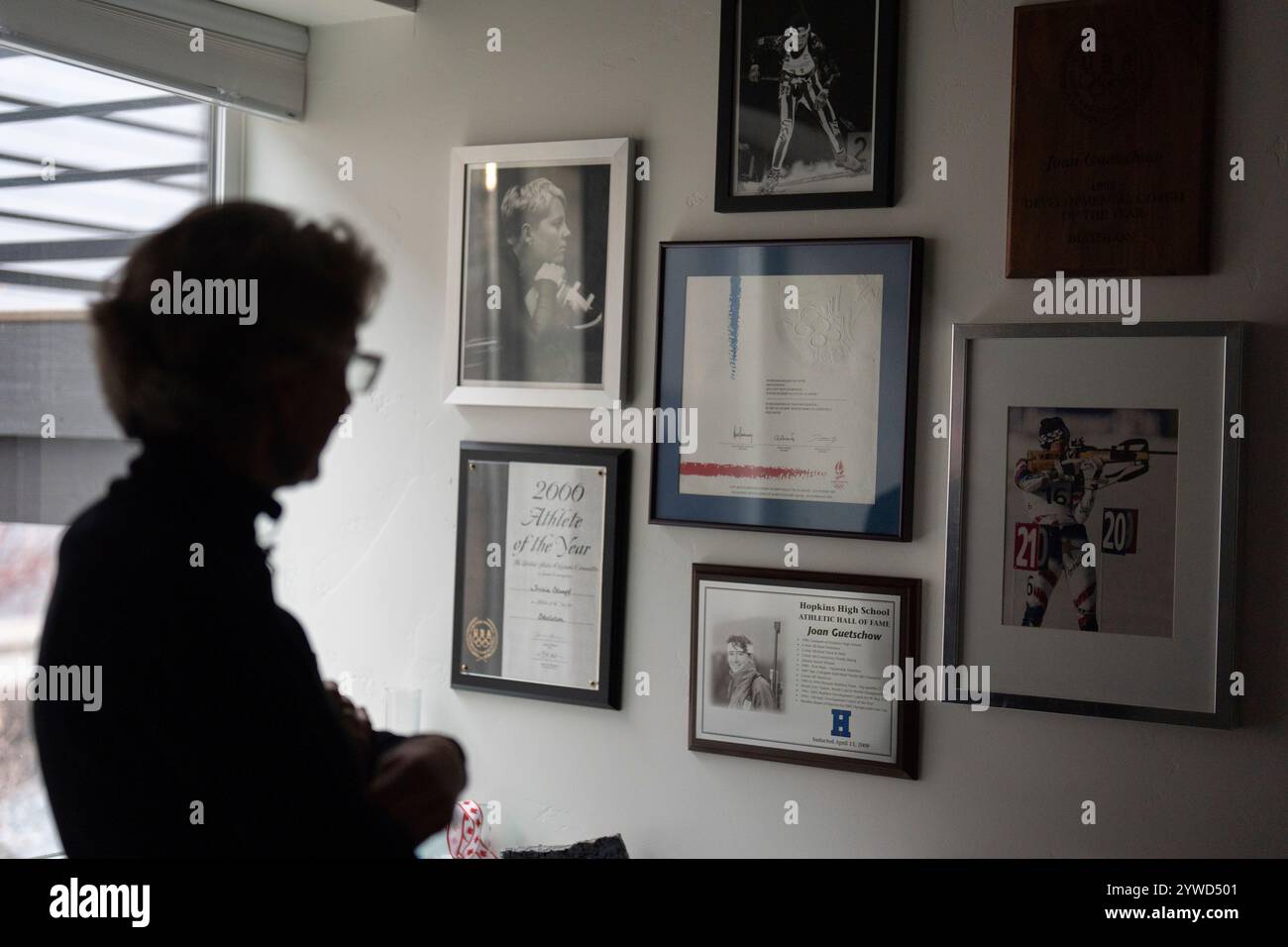Two-time Olympian Joan Wilder looks at memorabilia at her home on Nov ...