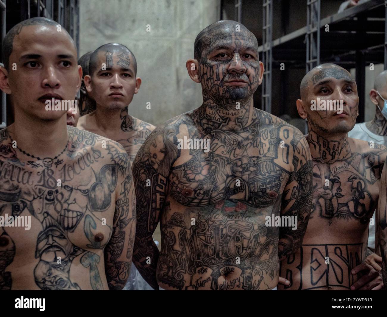 Toluca, El Salvador. 10th Dec, 2024. Gang members stand in their cell ...